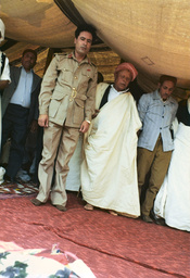 Muammar Gaddafi and Men praying - Sousa, Libya