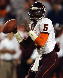 Virginia Tech coach Marcus Vick (5) looks downfield in the first ...